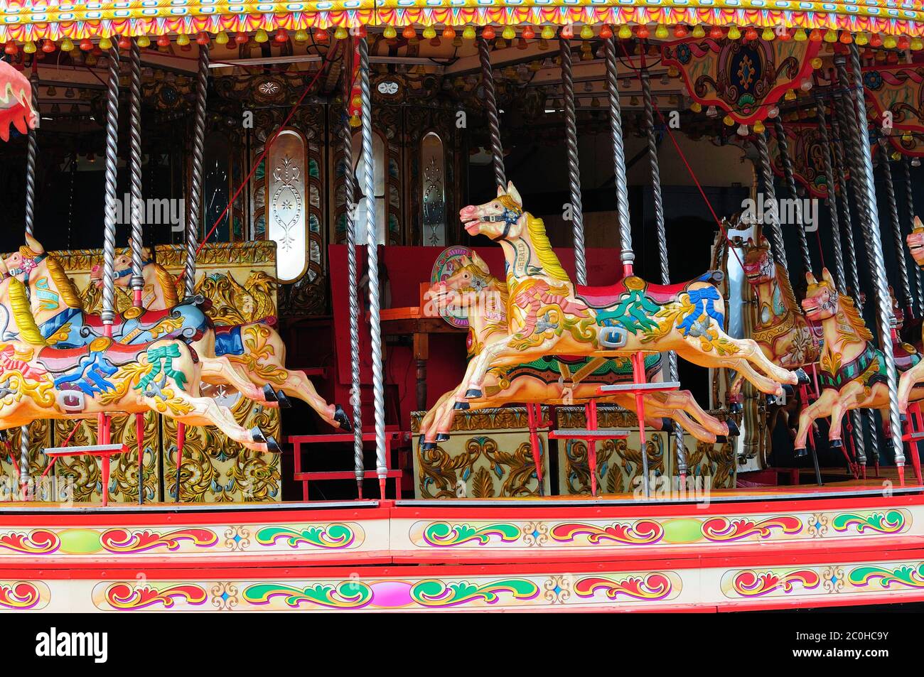 Funfair carousel or merry-go-round Stock Photo - Alamy