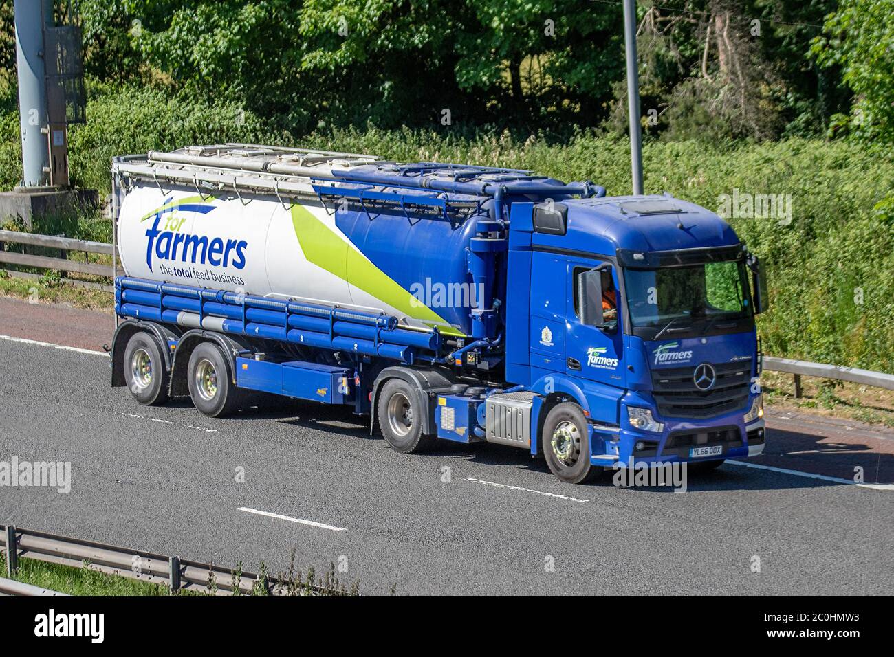 Farmers Total Feed Business; Haulage delivery trucks, blue white lorry ...