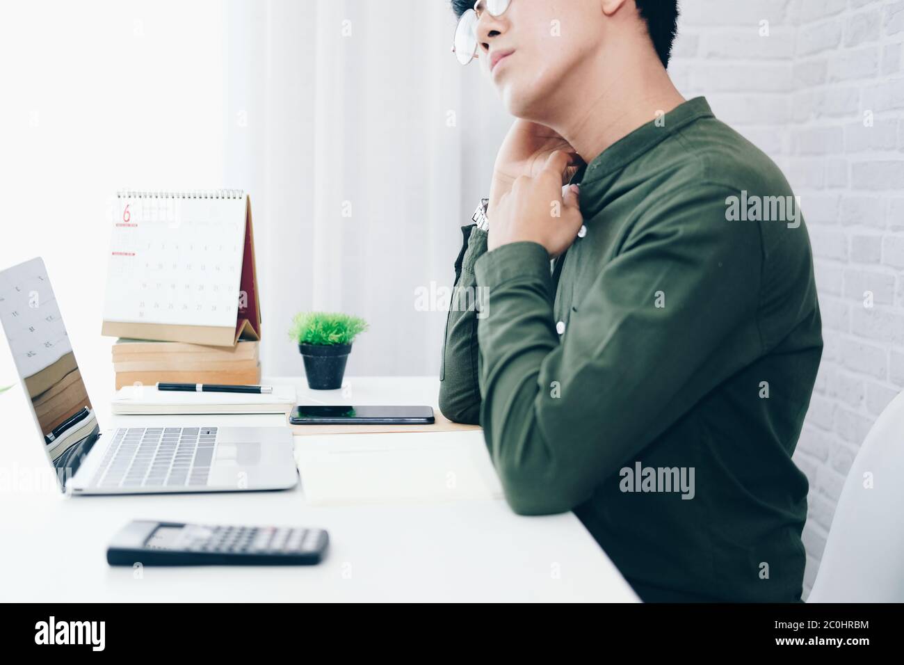 freelancer man businessman feeling tired exhausted from neck pain Stock ...