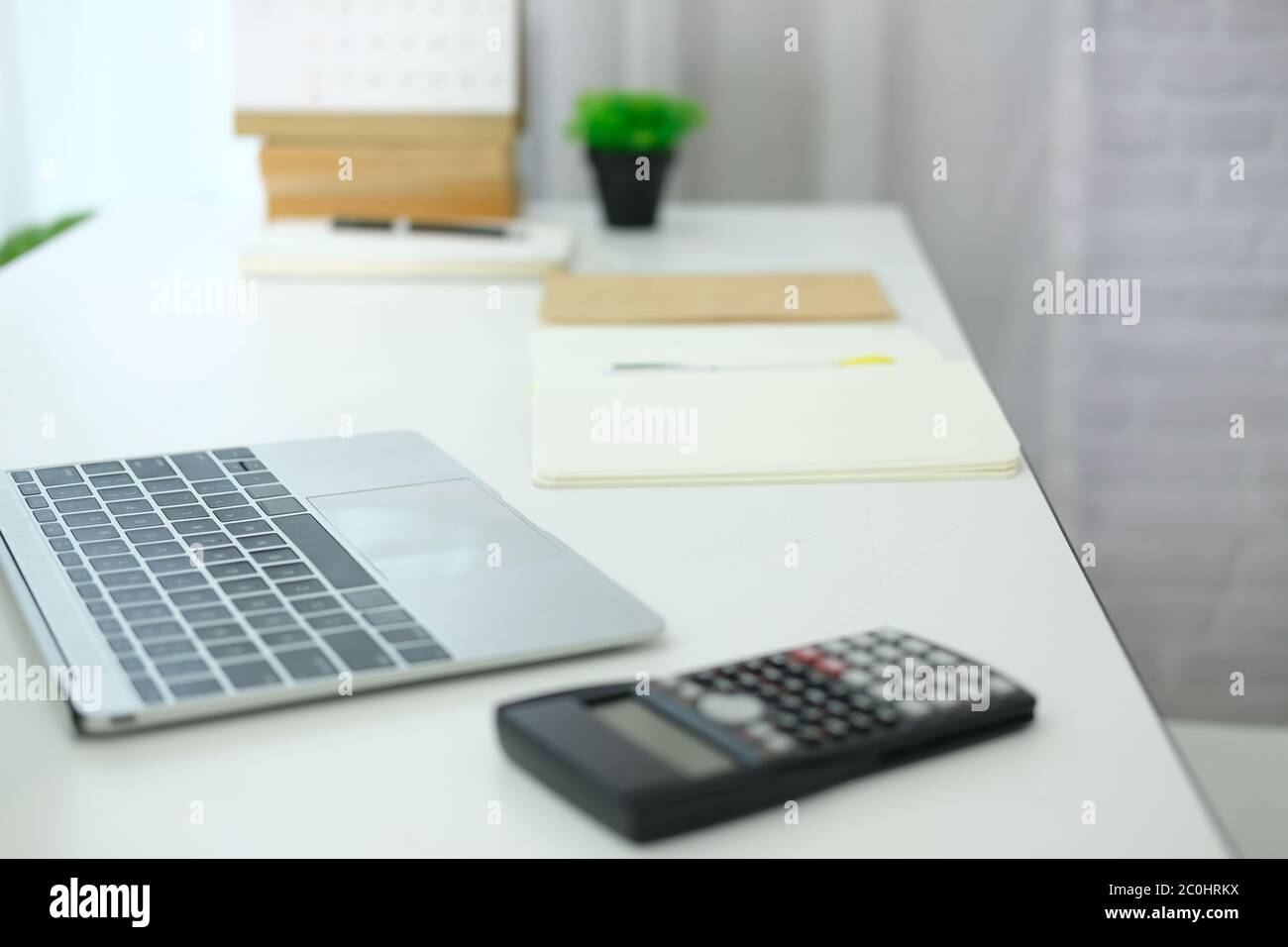 computer laptop calculator notebook on office desk. workplace interior ...