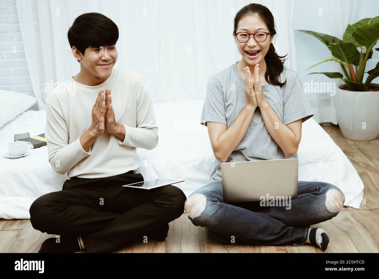 man woman friends using computer tablet. startup teamwork team feeling ...