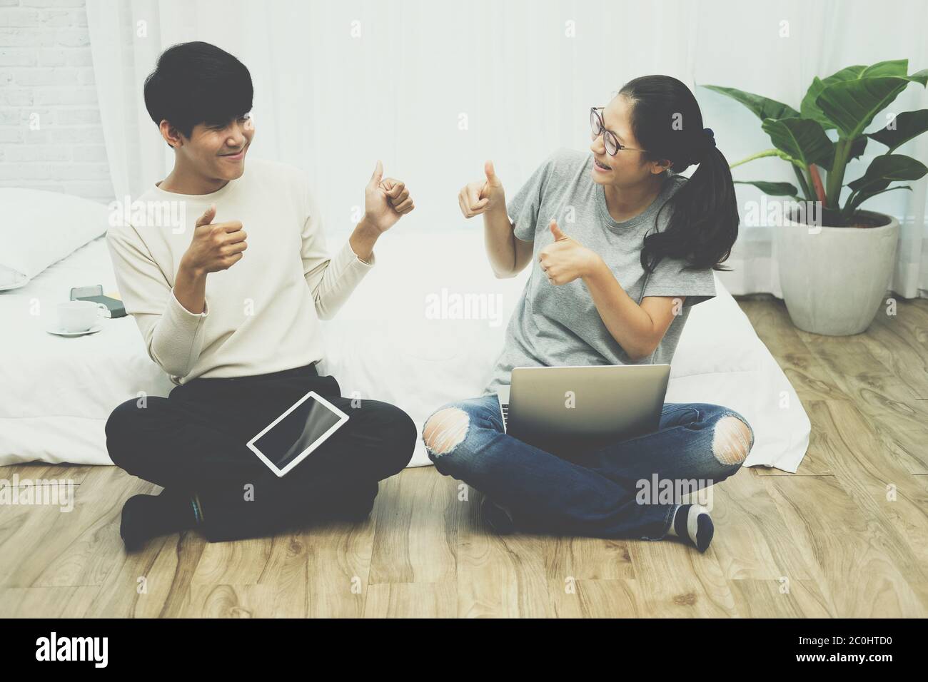 man woman friends using computer tablet. startup teamwork team feeling ...