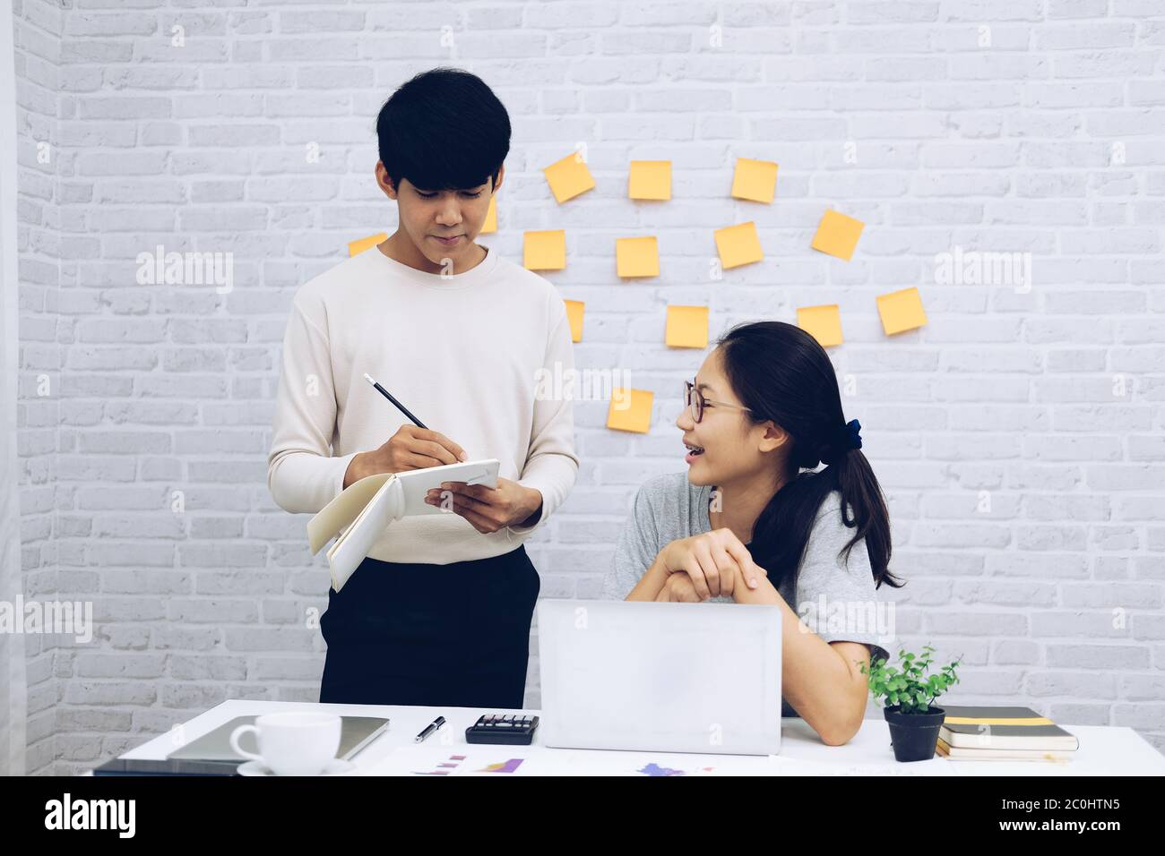 Man Woman Colleagues Analyzing Data On Computer Startup Teamwork Coworking Team Working At Home