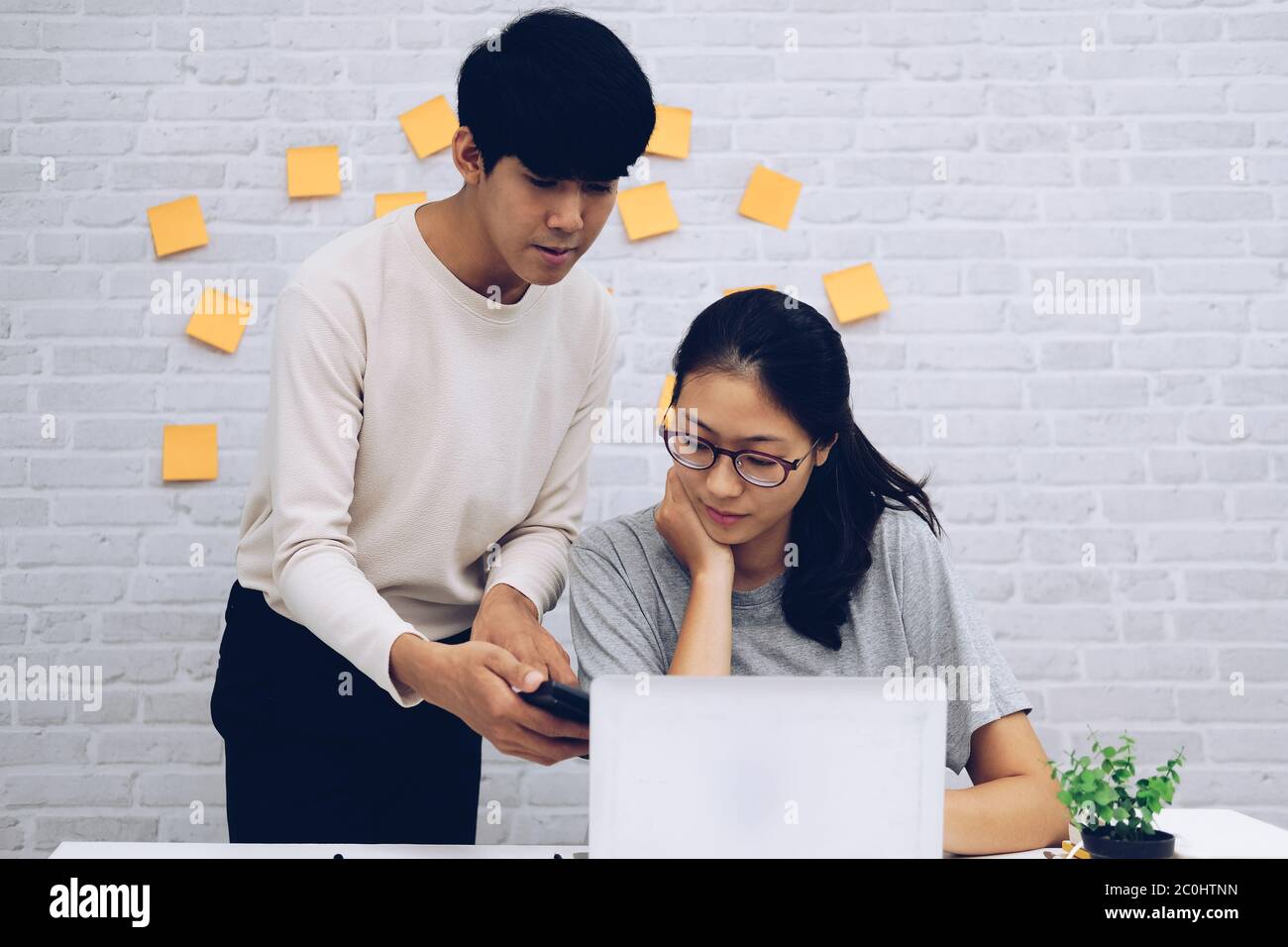 Man Woman Colleagues Analyzing Data On Computer Startup Teamwork Coworking Team Working At Home