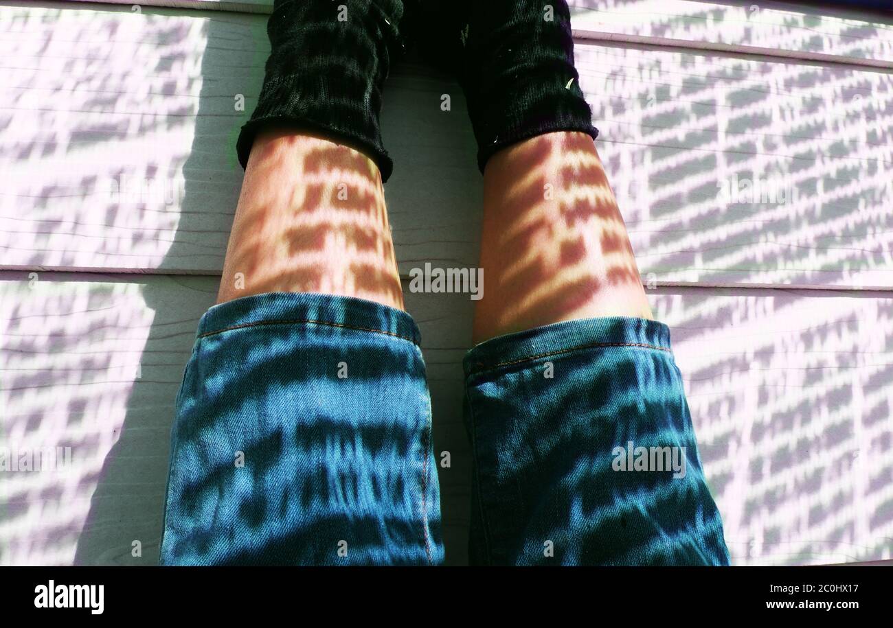 Vietnamese woman enjoy with funny relax when feet up the wall, amazing ...