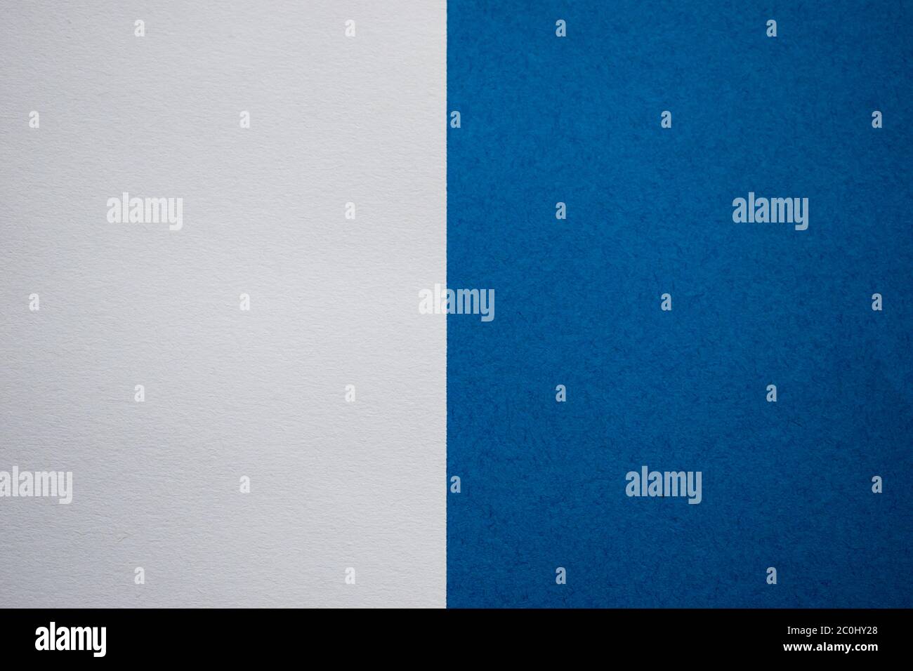 White and blue abstract background divided vertically Stock Photo - Alamy
