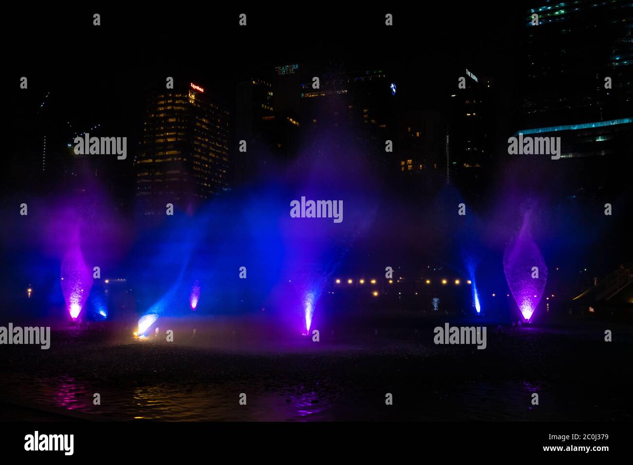Night view of the dancing multi-colored fountains. Show of Singing ...