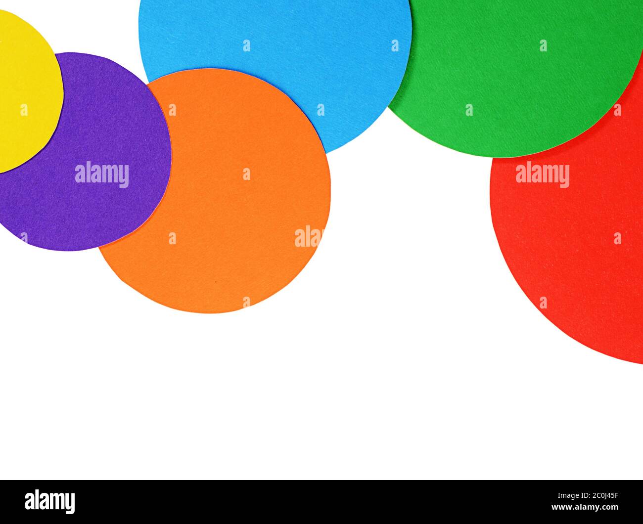 Circles color paper isolated on white Stock Photo - Alamy