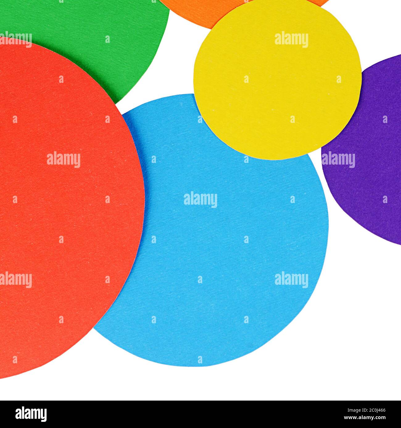 Circles color paper isolated on white Stock Photo - Alamy