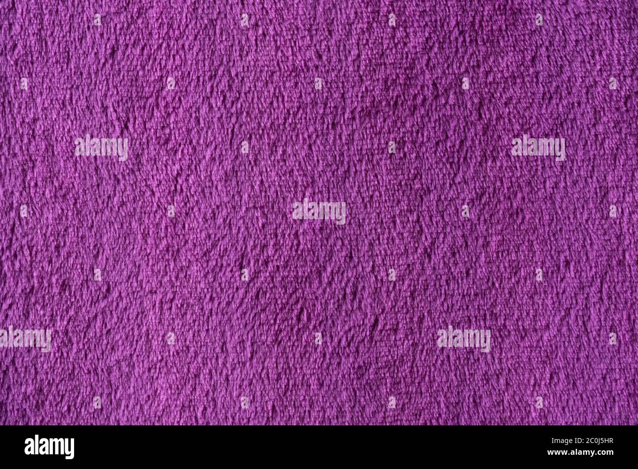 Texture purple velvet fabric close up Stock Photo - Alamy