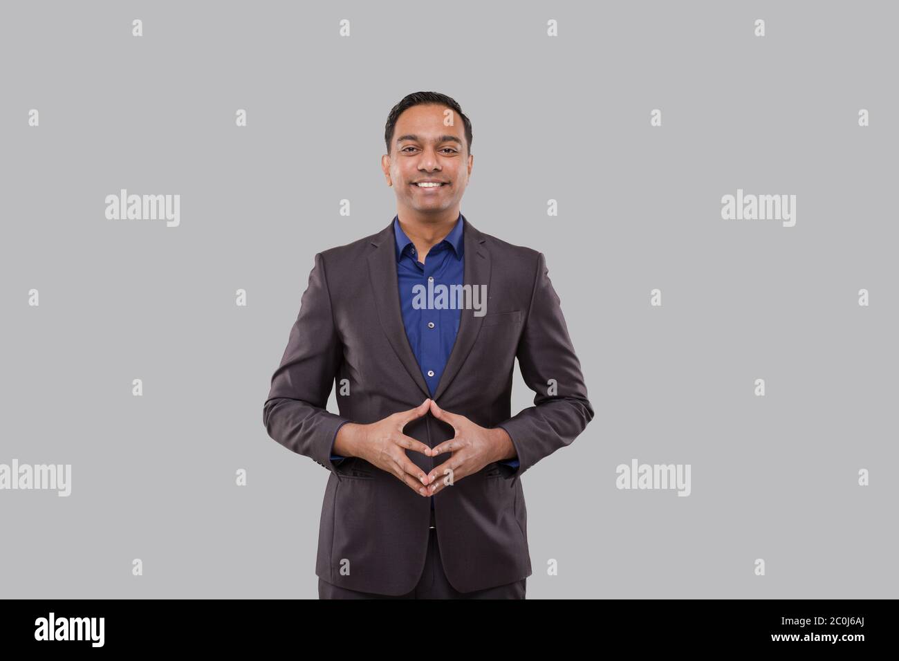 Businessman Smilling Hands in Front of Chest Isolated. Indian Business ...