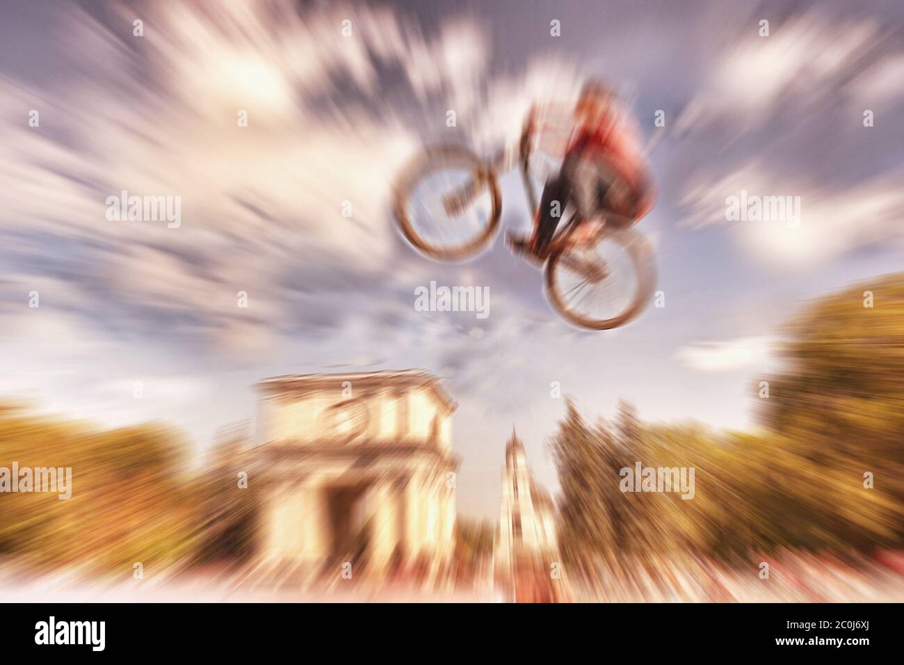 Abstract background . Boy on a BMX mountain bike jumping. Motion blur ...
