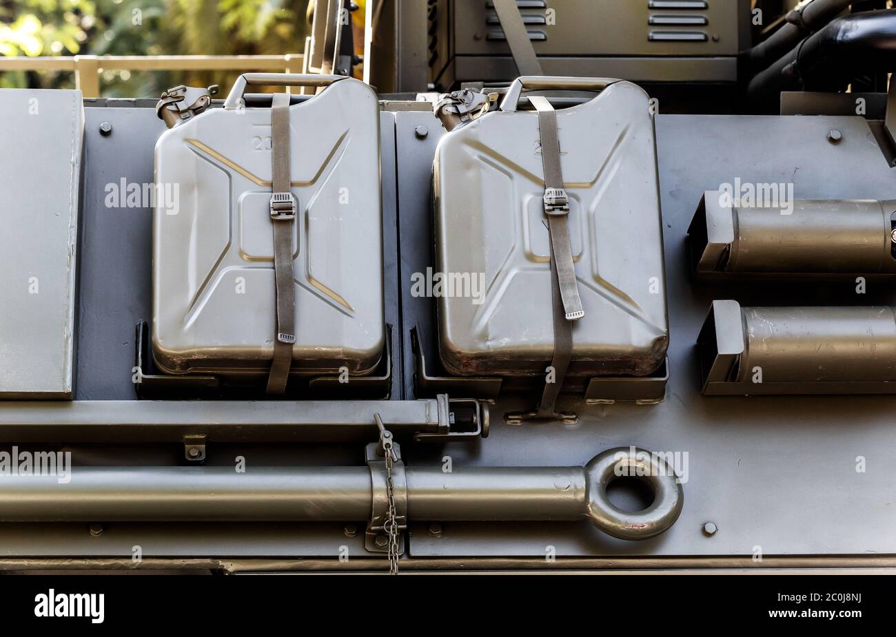 Closeup of armored military vehicle. Detail of different work tools on ...