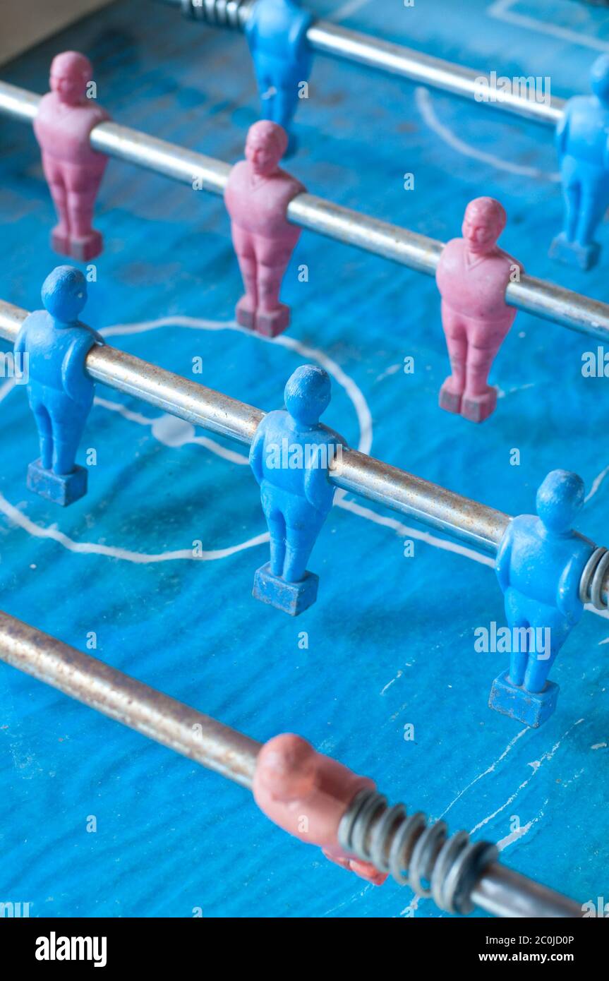 Foosball , football players and through slats of wood Stock Photo - Alamy