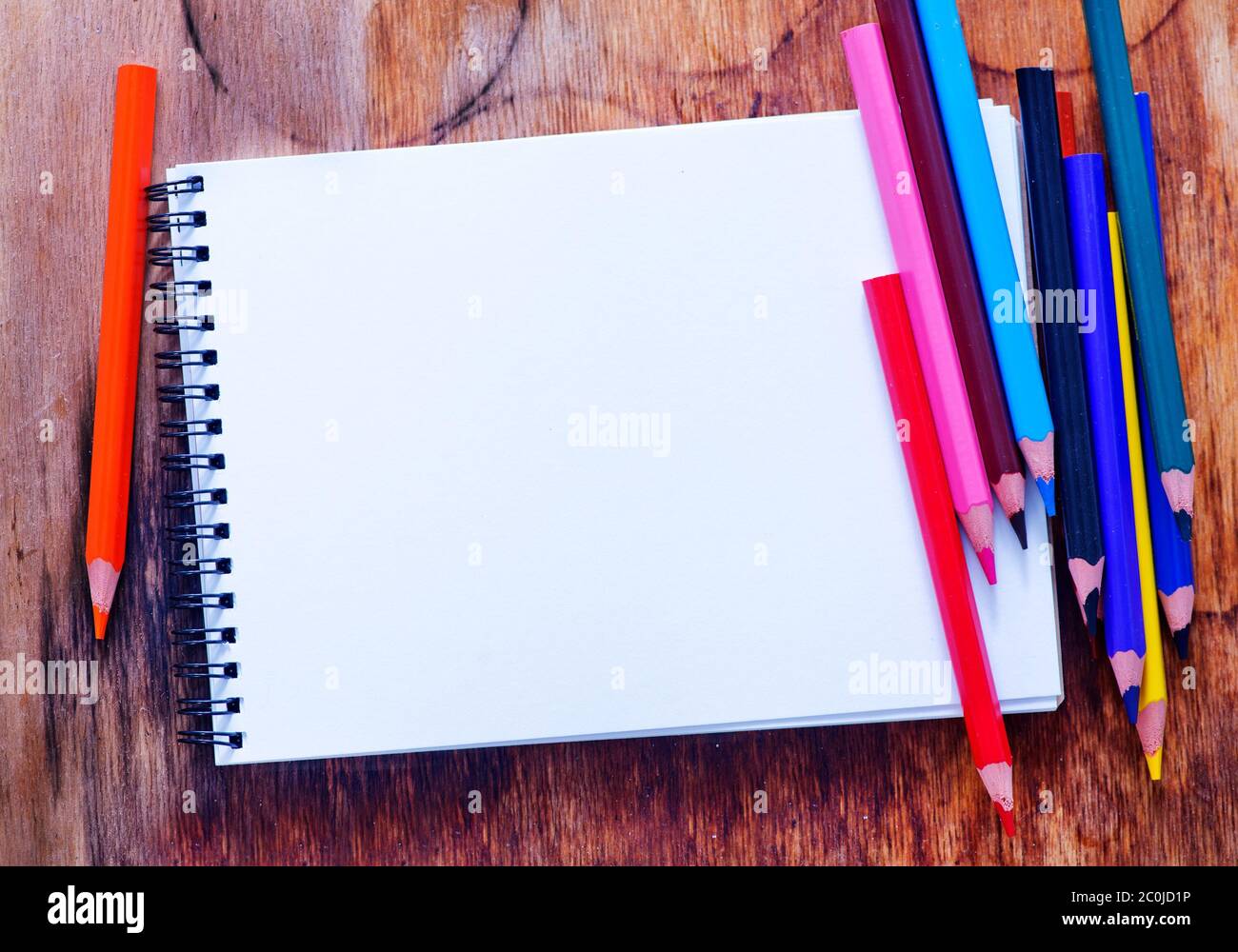 pencils and note Stock Photo - Alamy