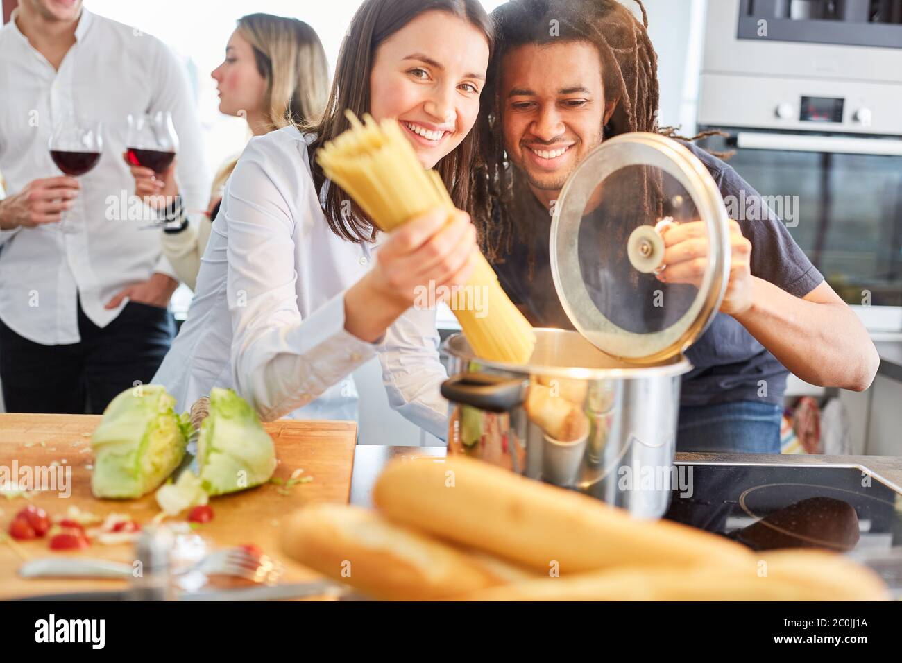 Man cooking spaghetti hi-res stock photography and images - Alamy