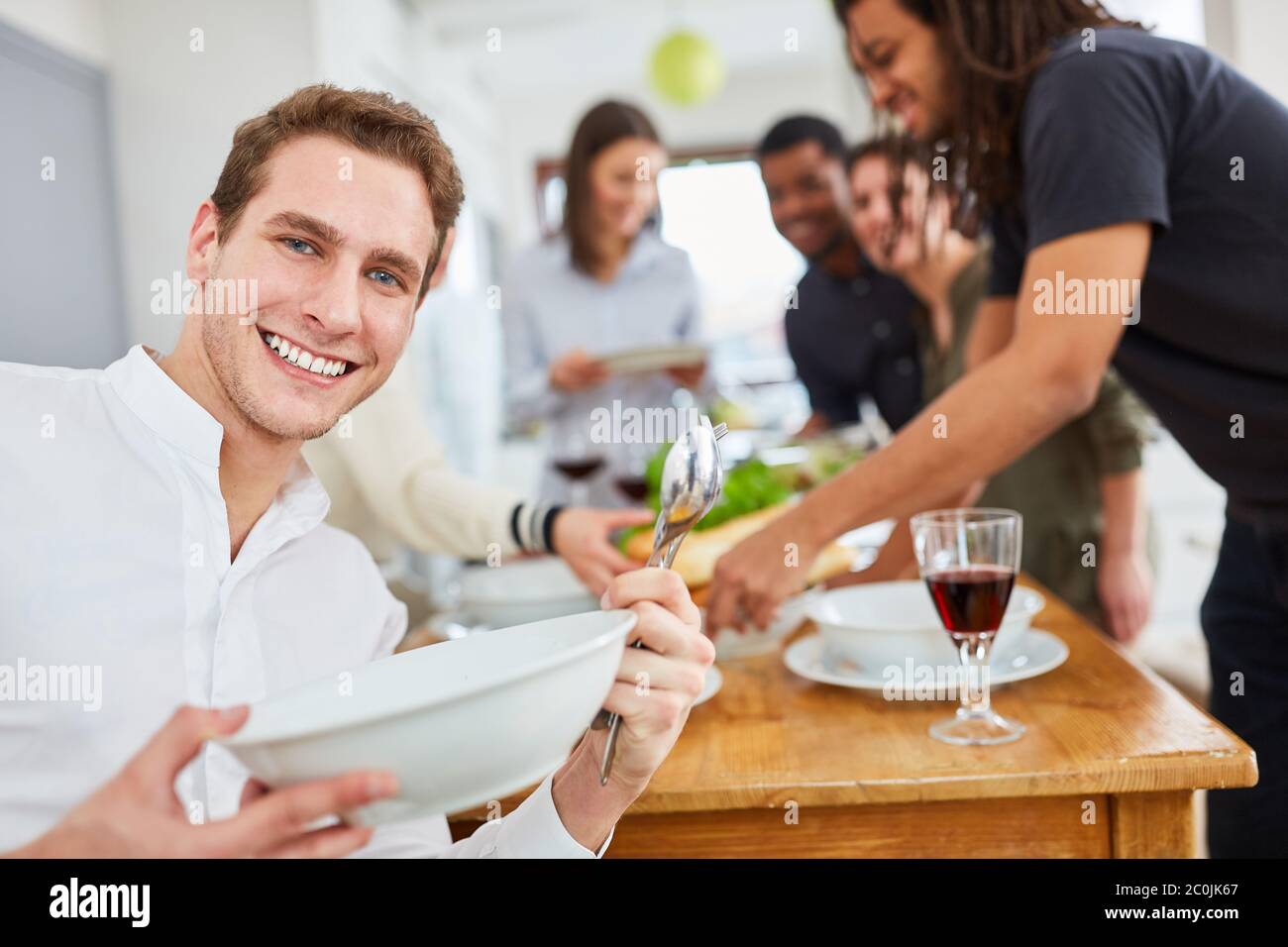 Shared table hi-res stock photography and images - Alamy