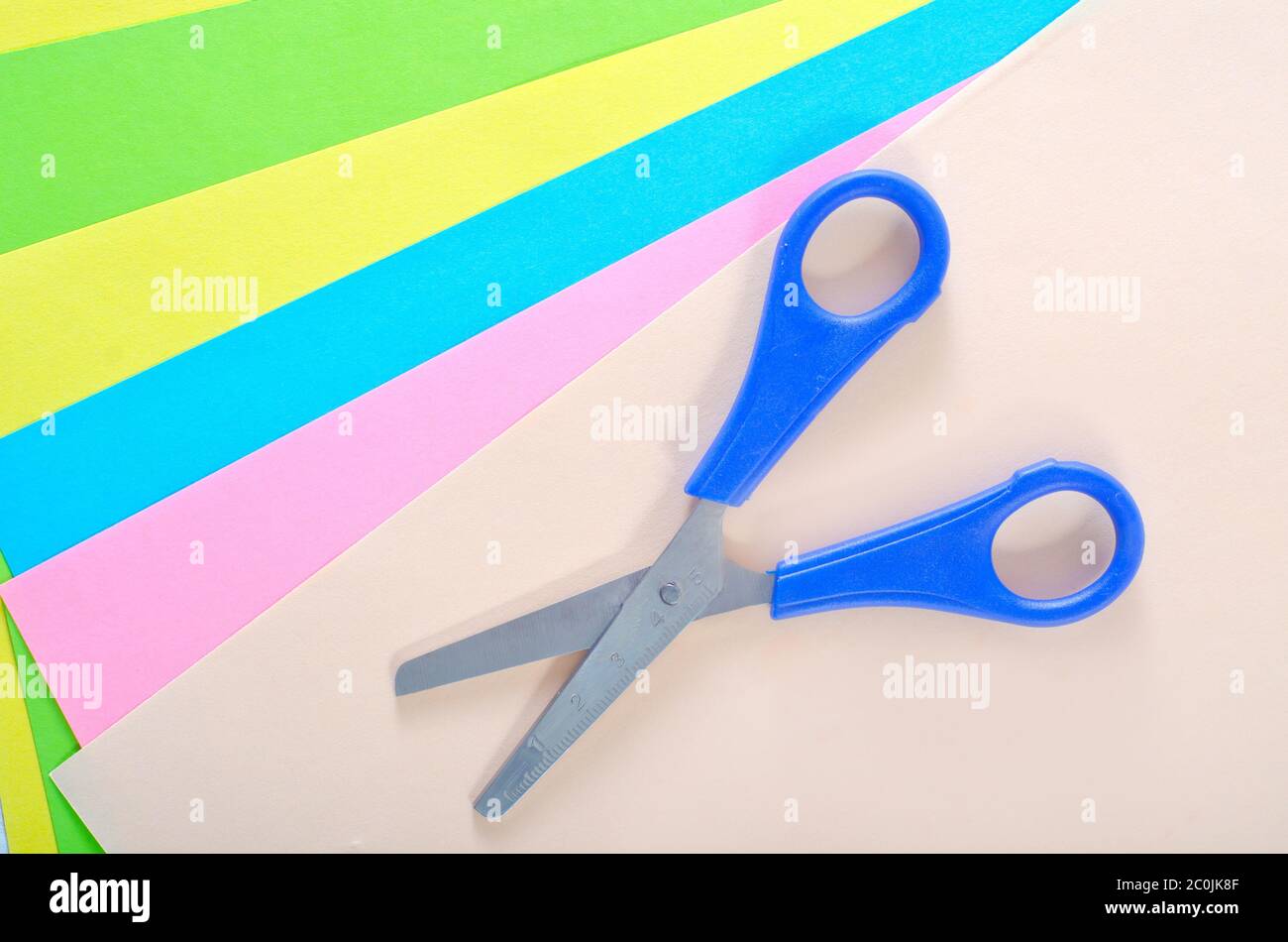 scissors and color paper Stock Photo - Alamy