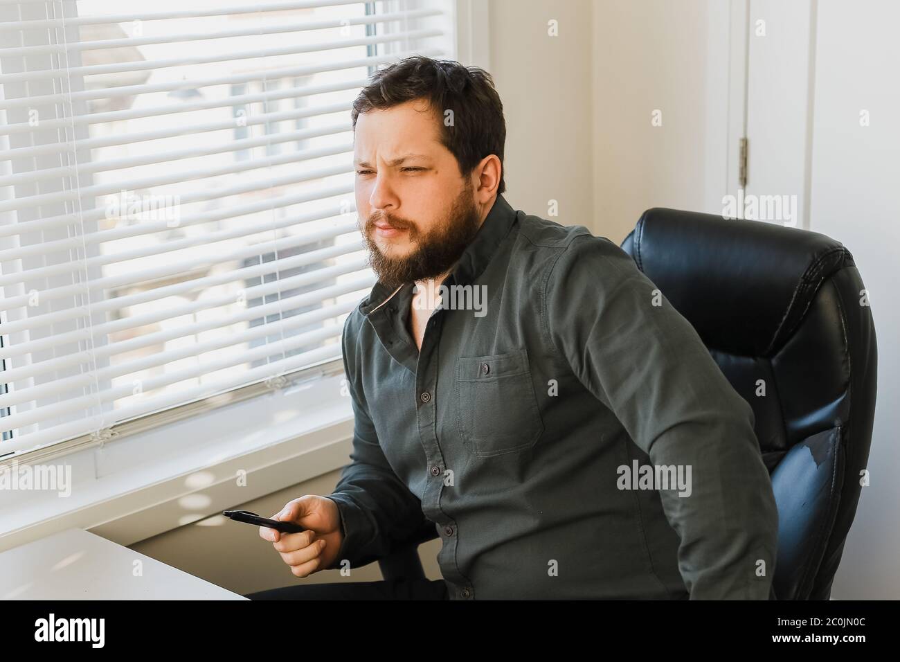 Male business director sitting hi-res stock photography and images - Alamy