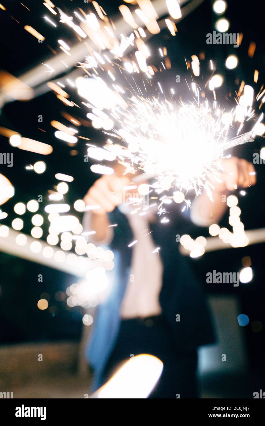 A close-up of sparks of a large bengali fire Stock Photo - Alamy