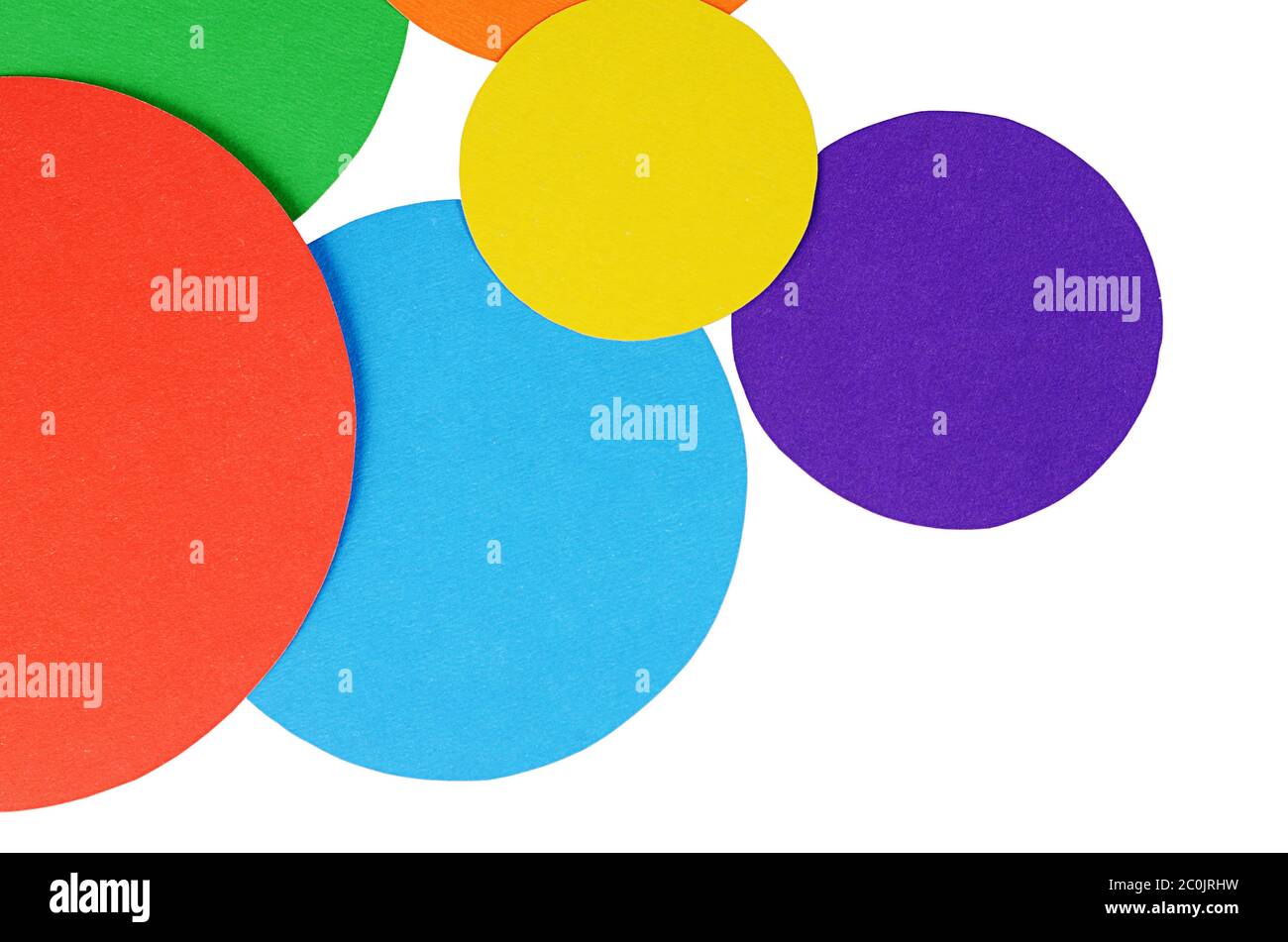 Circles color paper isolated on white Stock Photo - Alamy