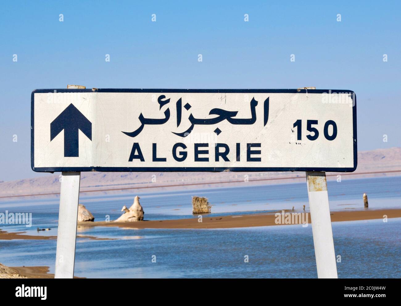 The Chott el-Jérid Salt Lake, Tunis: Algeria traffic sign in Arabic ...
