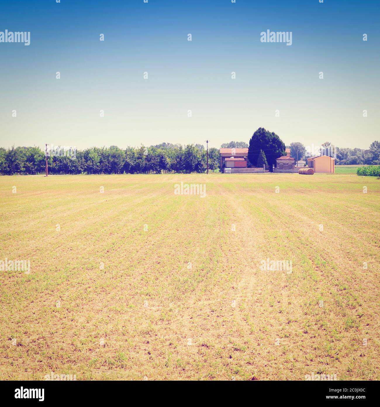 Farm field with church hi-res stock photography and images - Alamy
