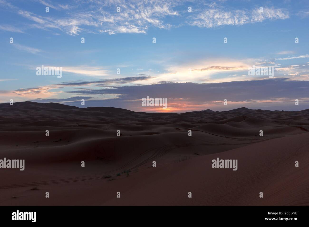 landscape at sunset in sahara desert Stock Photo - Alamy