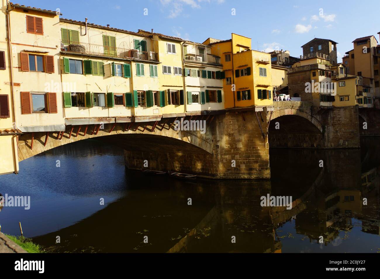 Ponte Vecchio, segmental arch bridge over the Arno river Stock Photo ...