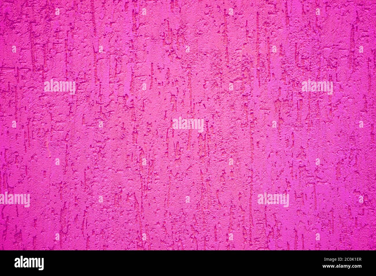 Background of magenta stone wall with textured drips Stock Photo - Alamy