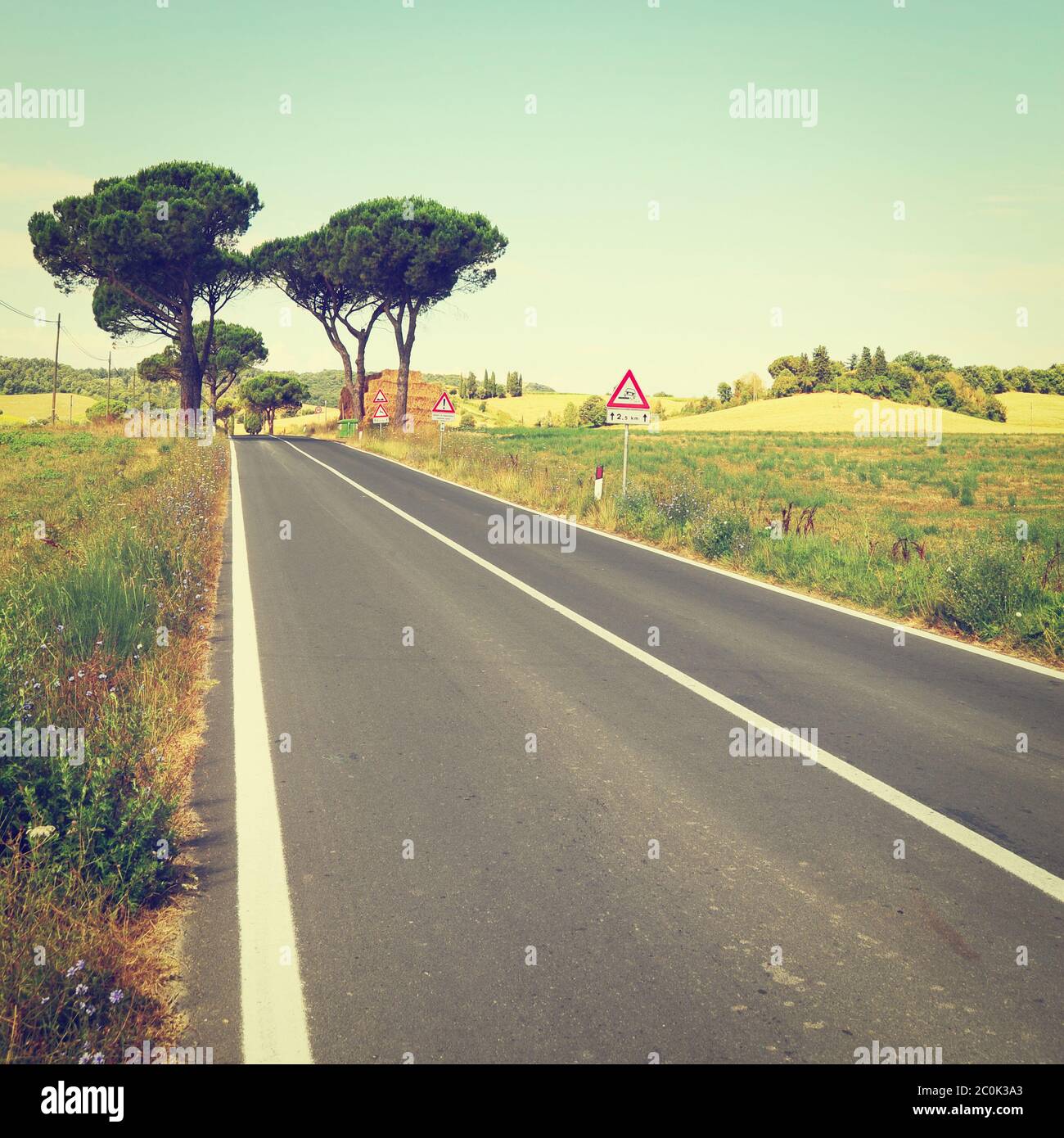 Straight road curve sign hi-res stock photography and images - Alamy