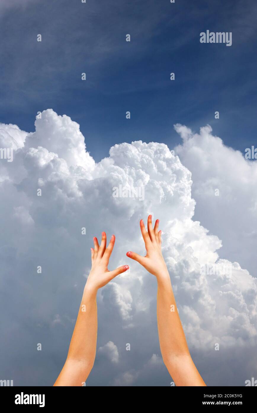 Hands in sky Stock Photo - Alamy