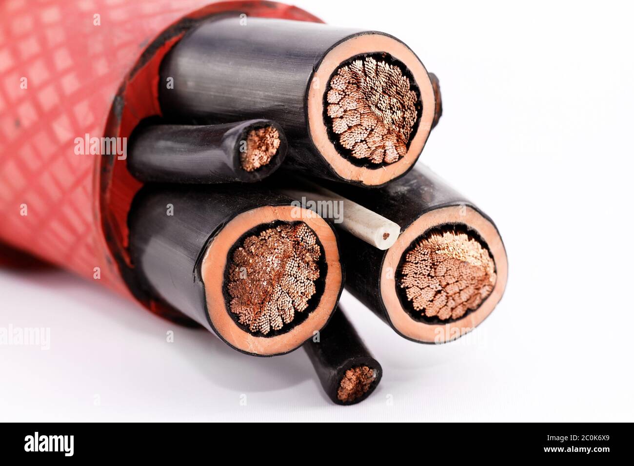 Close up photo of a high voltage cable isolated on white background ...