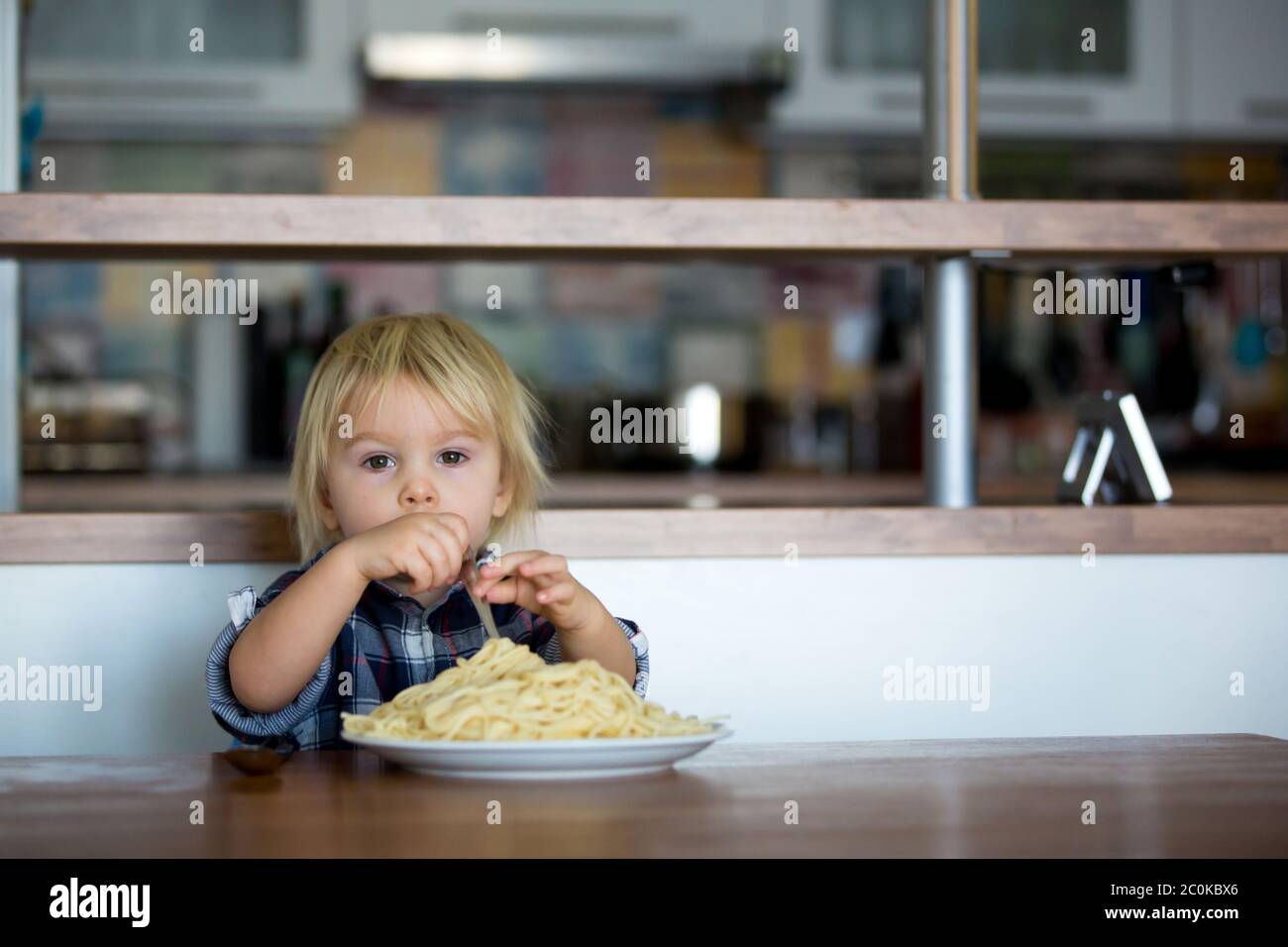 Little baby boy, toddler child, eating spaghetti for lunch and making ...