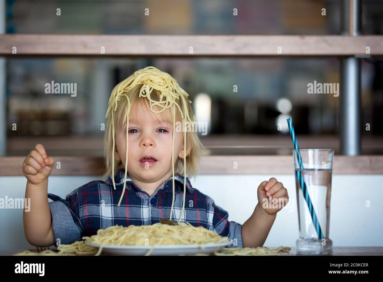 Little baby boy, toddler child, eating spaghetti for lunch and making ...