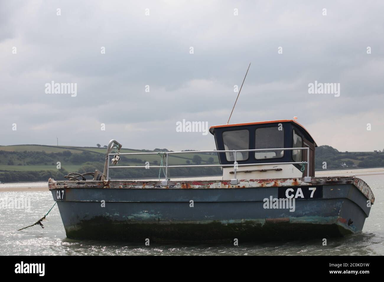 Fishing boat aground, Gwbert, Wales Stock Photo - Alamy