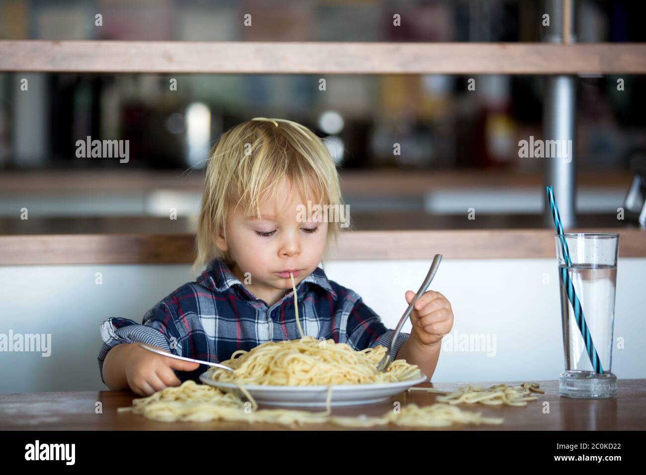 Little baby boy, toddler child, eating spaghetti for lunch and making ...