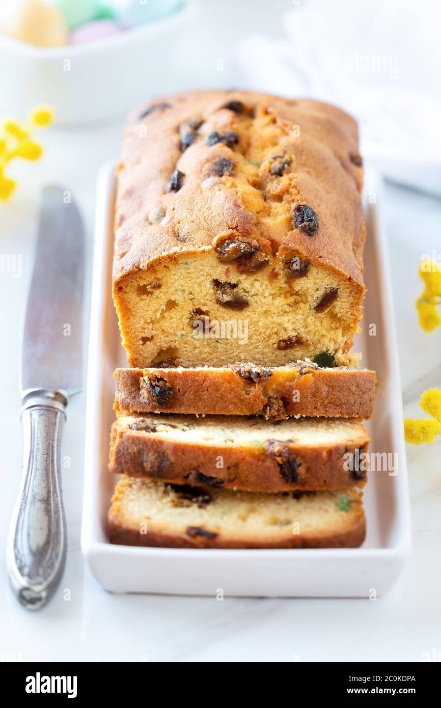 Delicious traditional fruitcake with raisins and candied fruit. Sliced ...