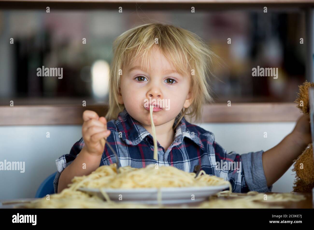 Little baby boy, toddler child, eating spaghetti for lunch and making ...