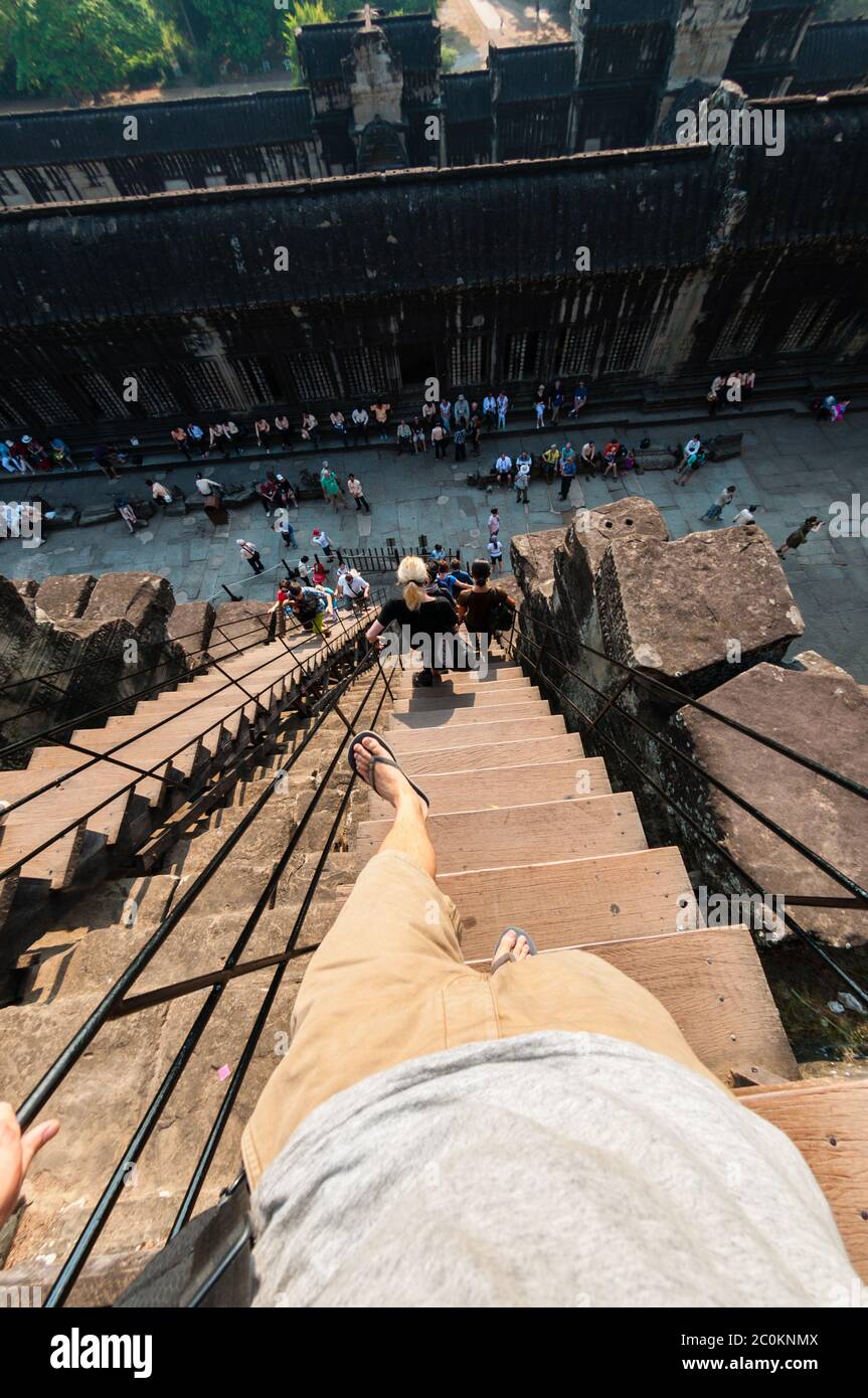 Person climbing down stairs Stock Photo - Alamy