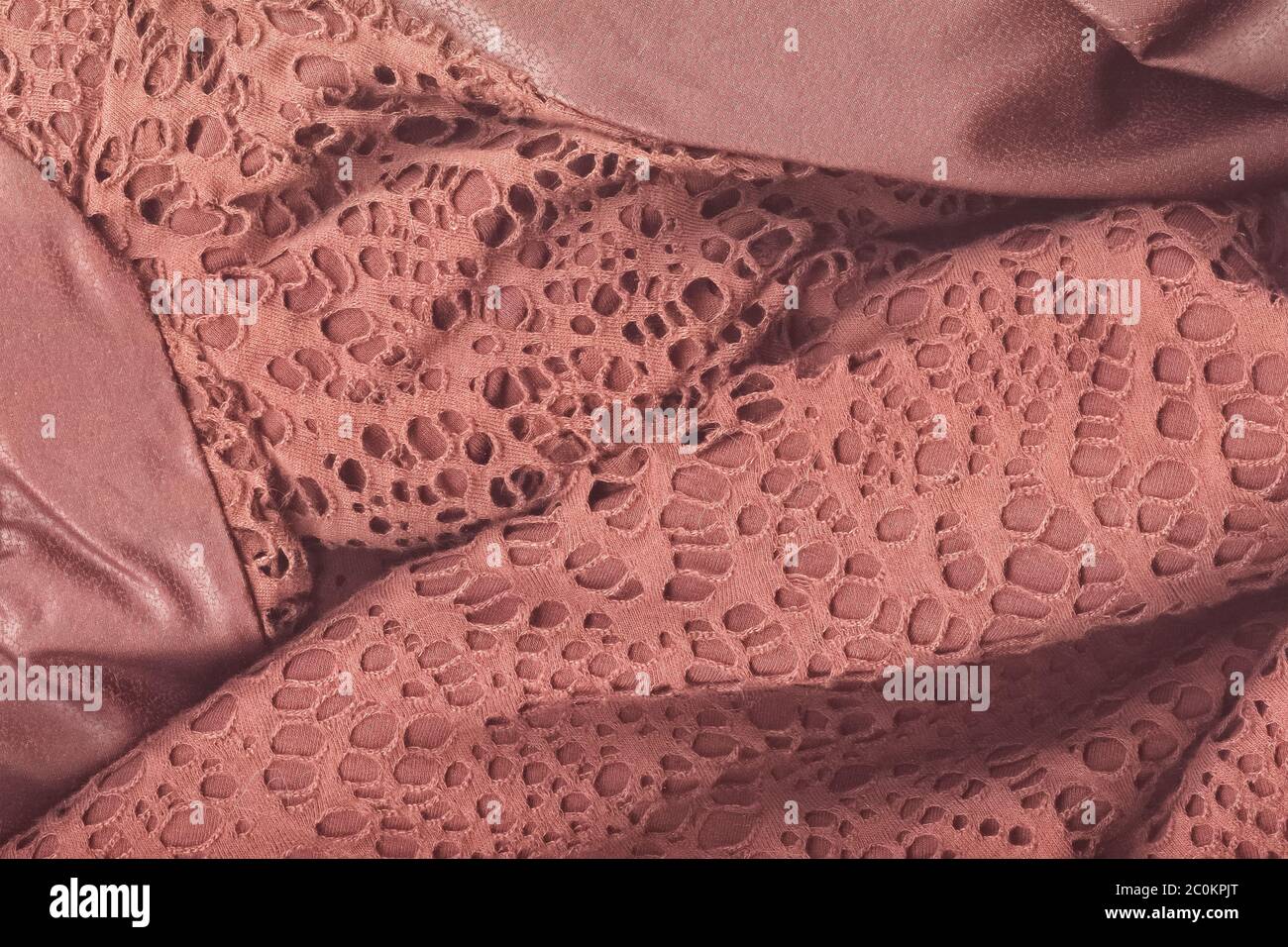 Texture of coral openwork fabric. Detailed shot of a beautiful fabric ...