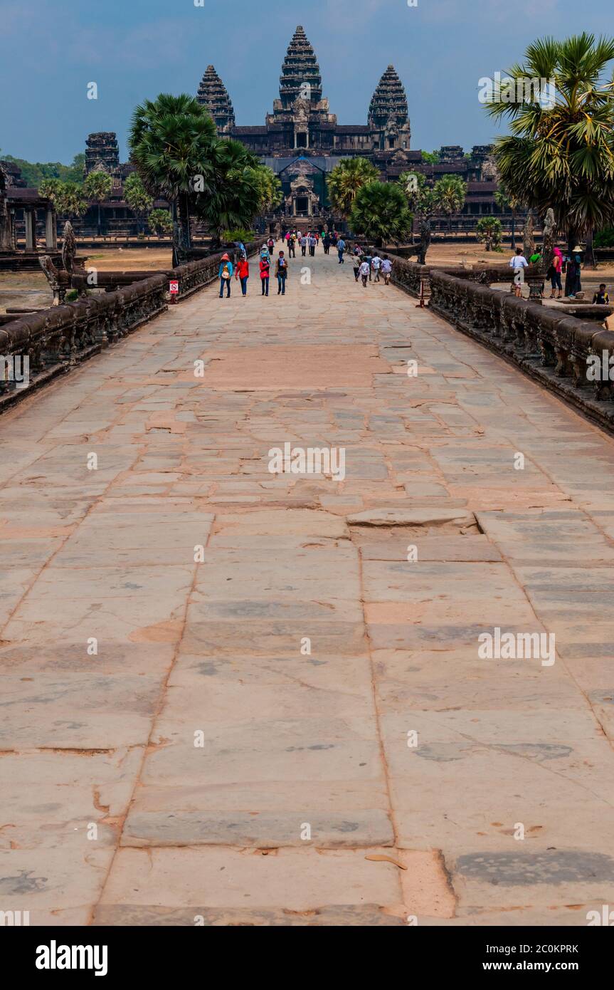 Path to Angkor Wat with people Stock Photo - Alamy