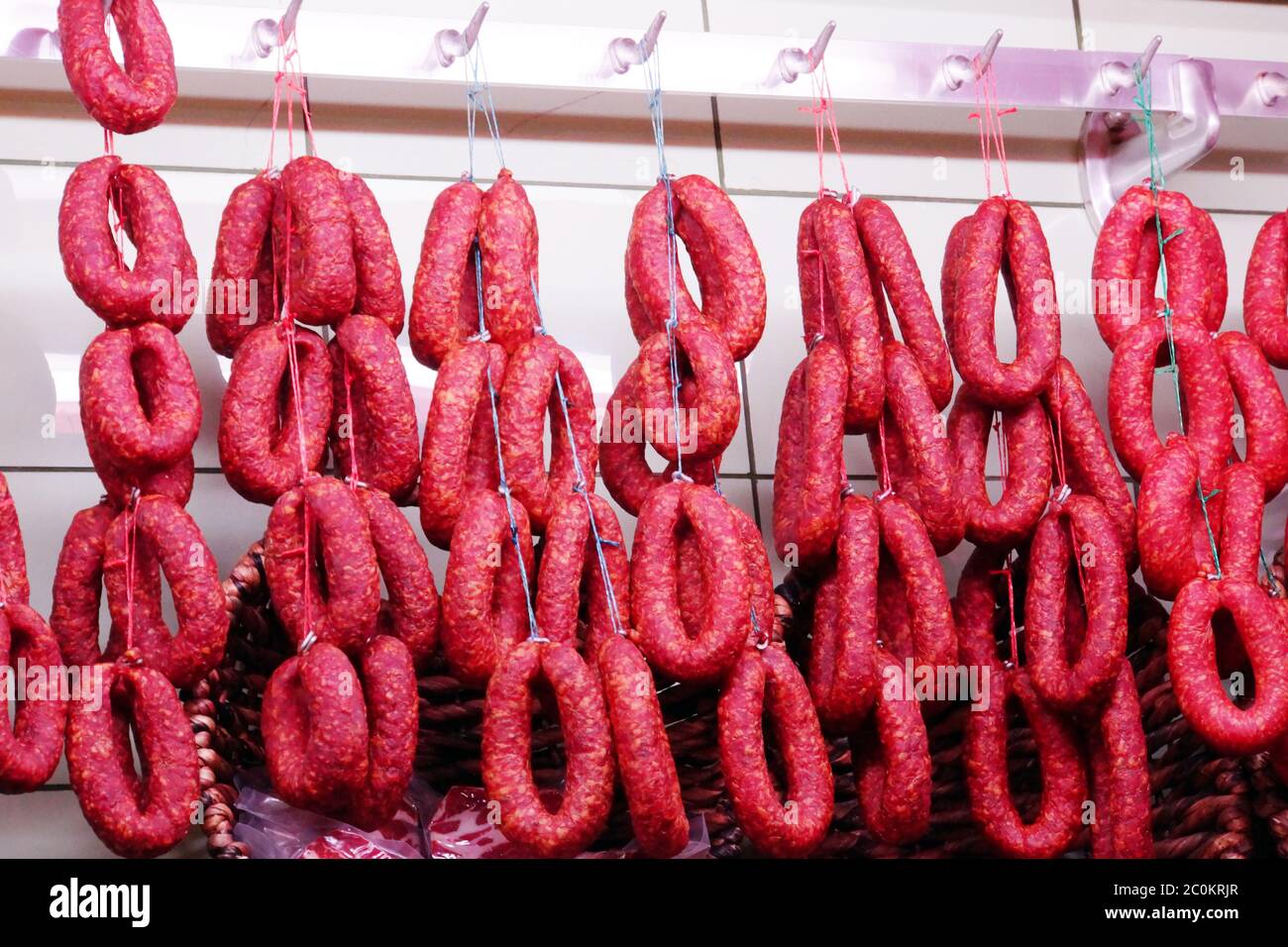 Sausage display in the butcher's shop Stock Photo - Alamy
