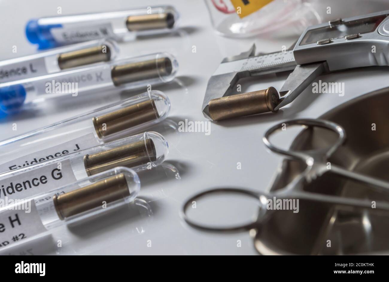 Expert Police measures bullet caliber in ballistic lab, conceptual ...