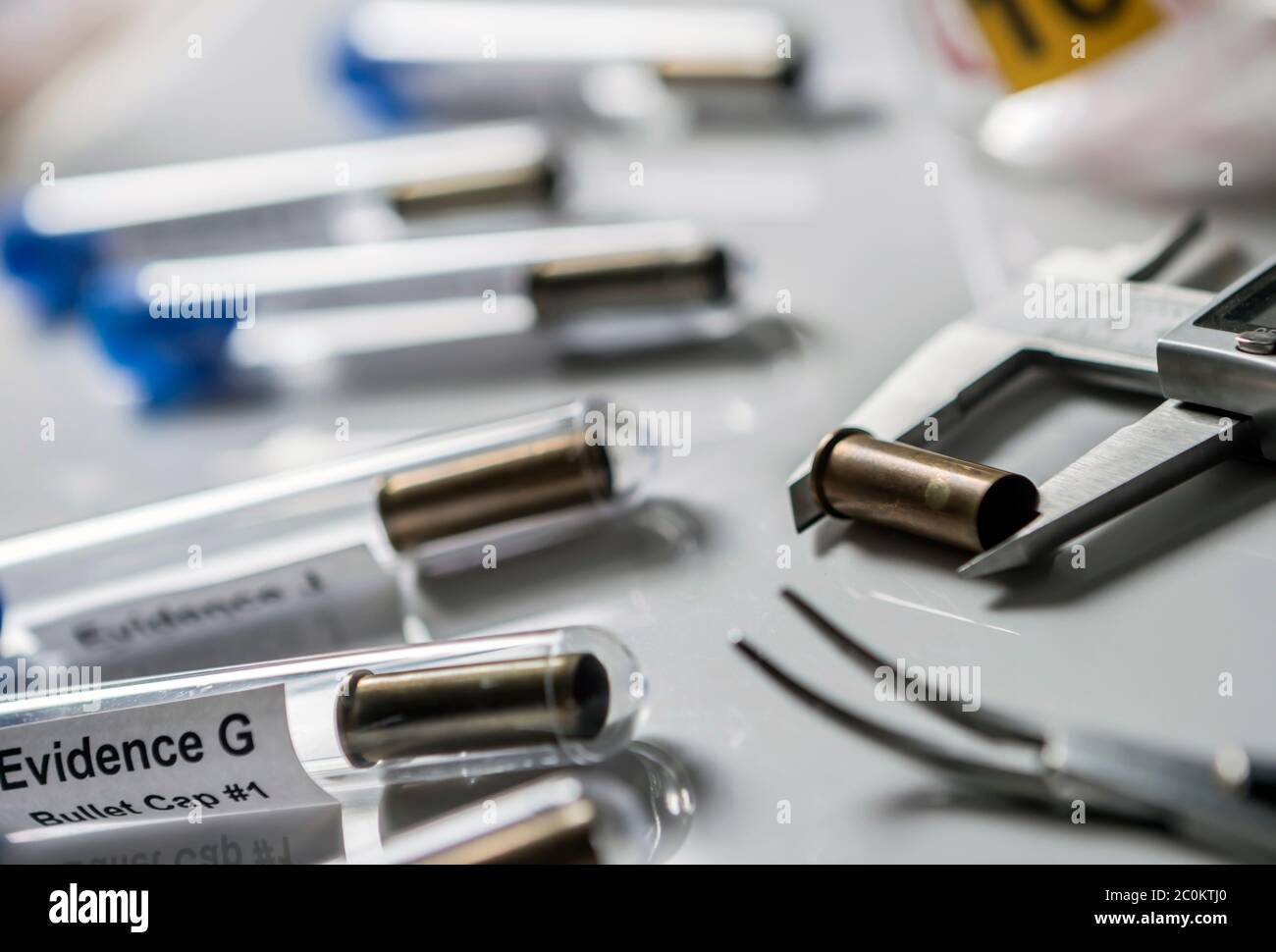 Expert Police measures bullet caliber in ballistic lab, conceptual ...