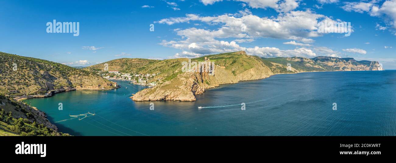Scenic view of Balaclava bay with yachts, ruines of Genoese fortress ...