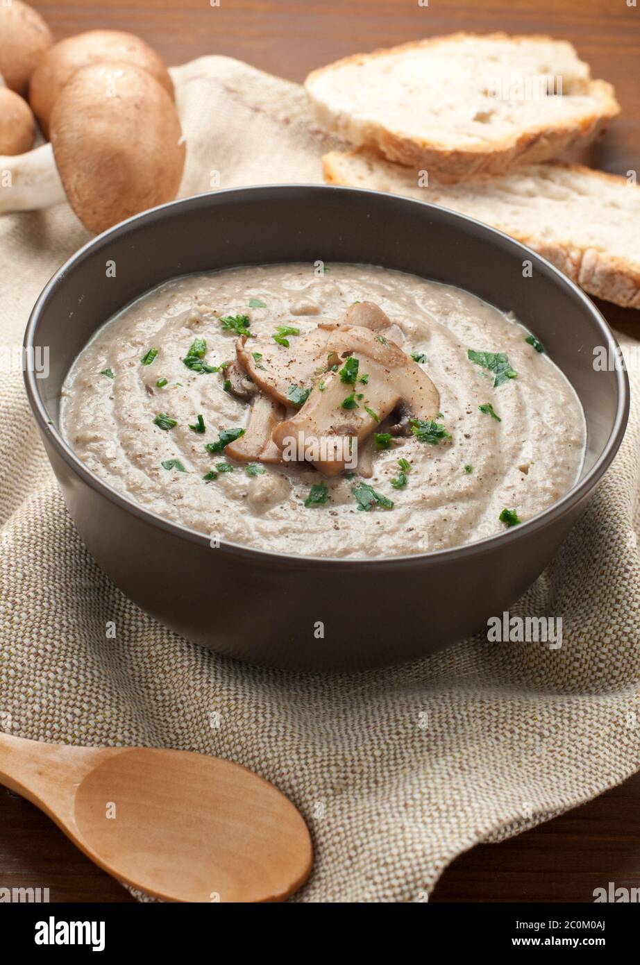 Cream of porcini mushrooms with cream and parsley Stock Photo - Alamy