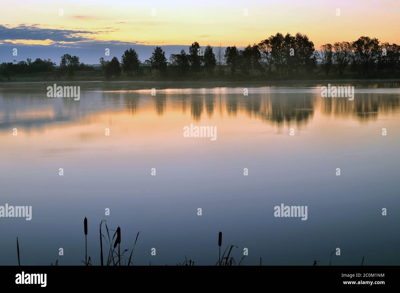 The morning landscape with sunrise over water in t Stock Photo - Alamy