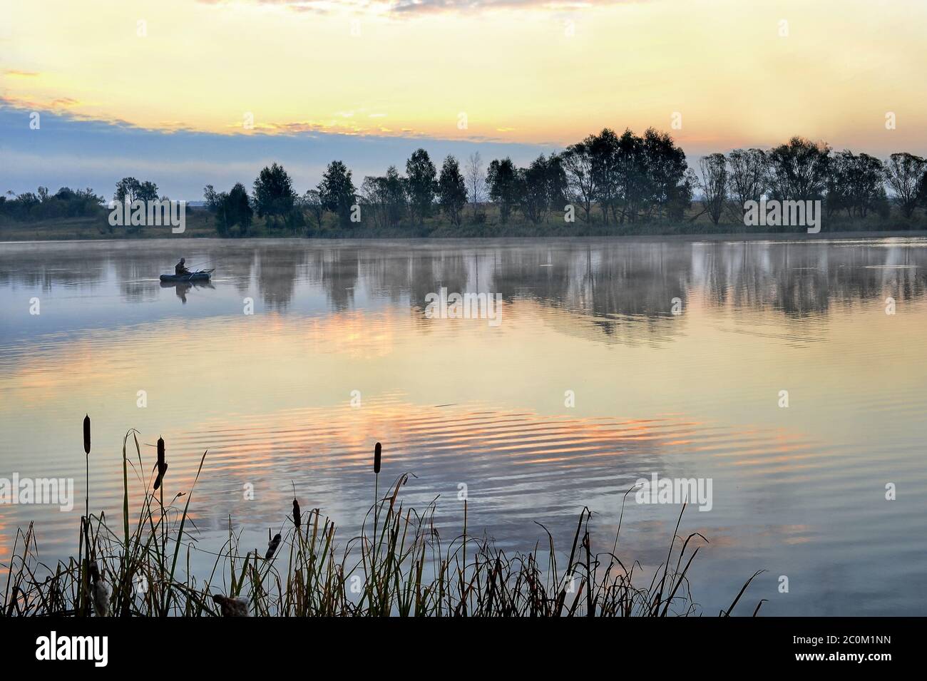 Fishing boat morning mist hi-res stock photography and images - Alamy
