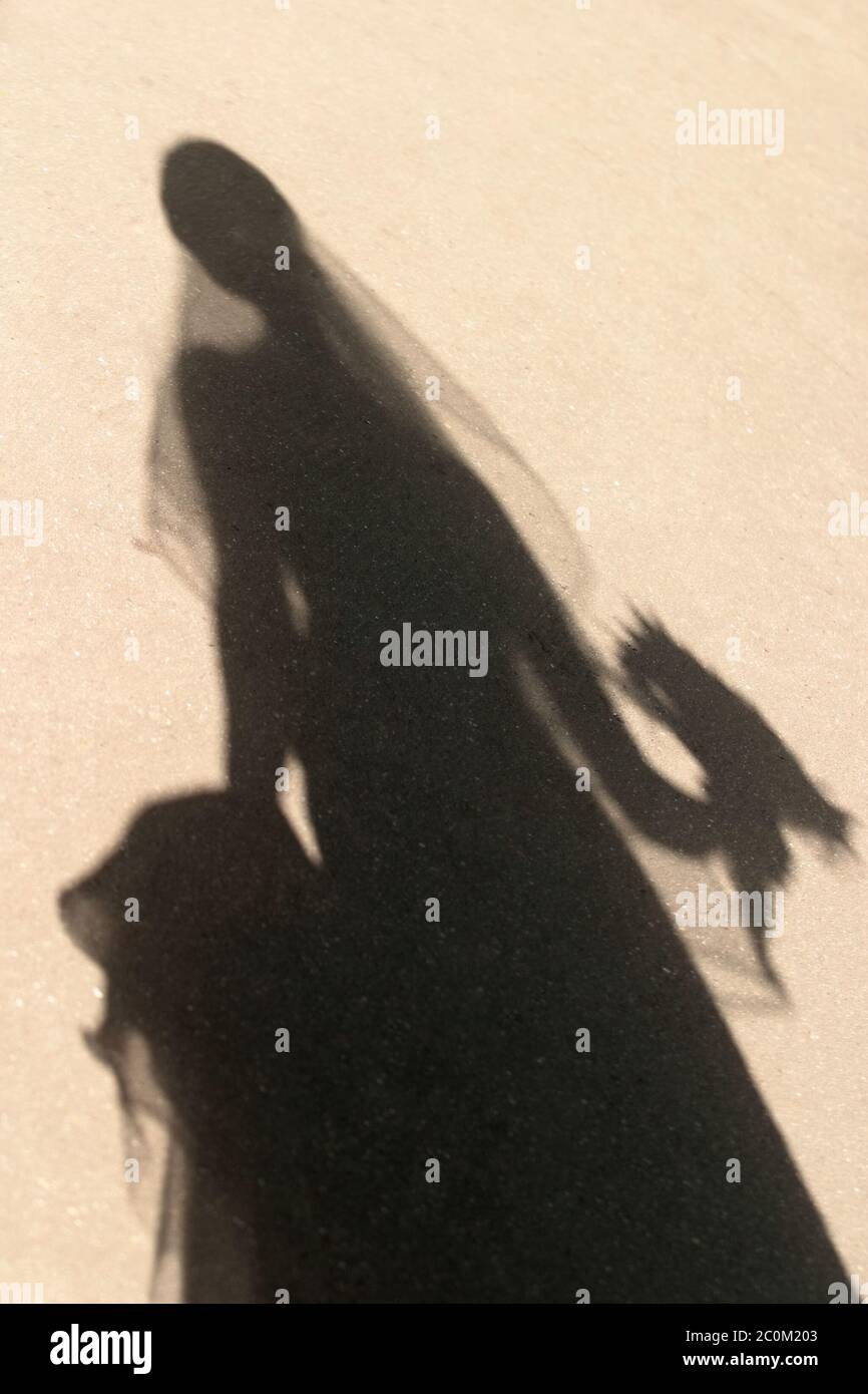 Shadow of the bride Stock Photo - Alamy